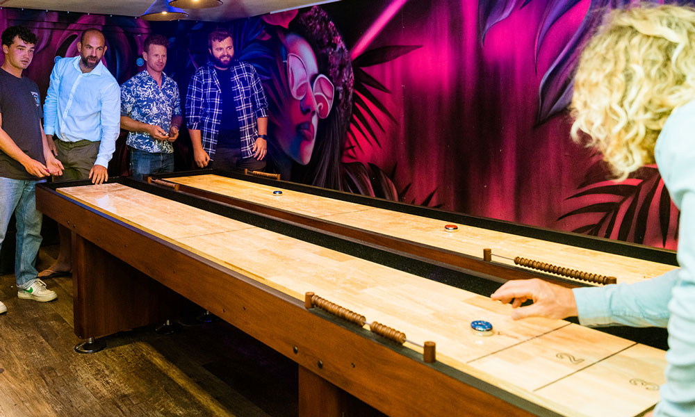 Shuffleboard at Cave Activity Bar | Fun for Groups in Newquay